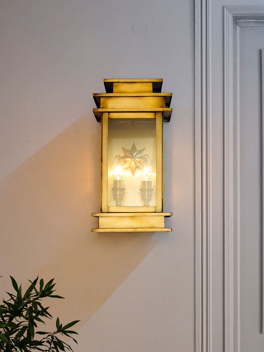 Art Deco Star Wall Sconce - Antique Brass Finish